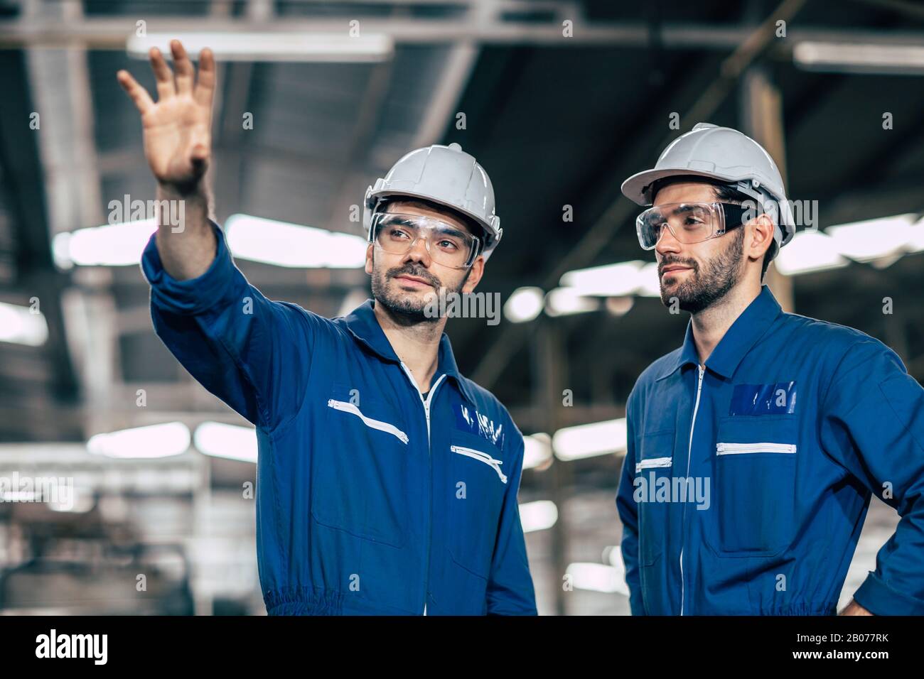 engineer team working together in factory industry to checking safety ...