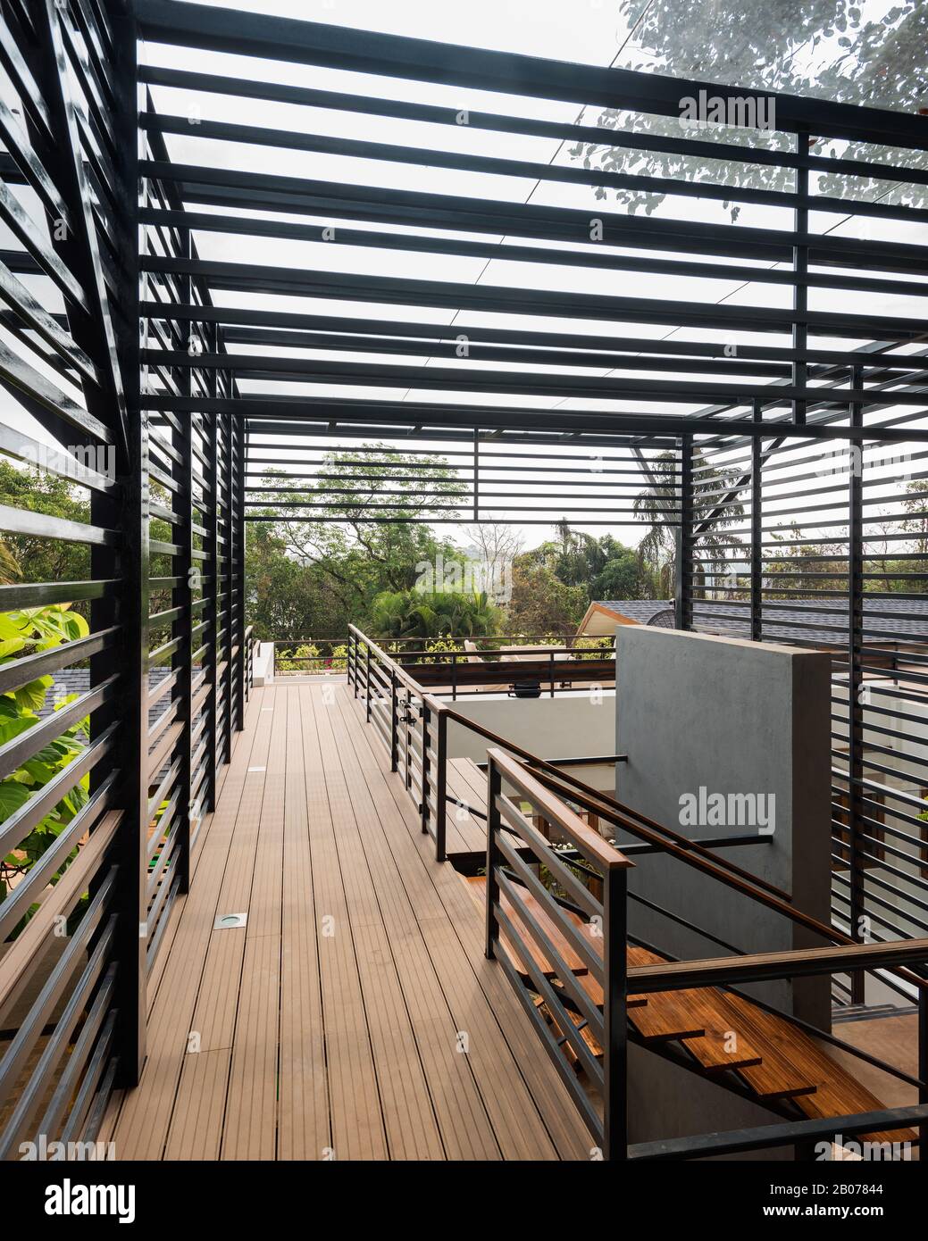 Deck under black railings Stock Photo - Alamy