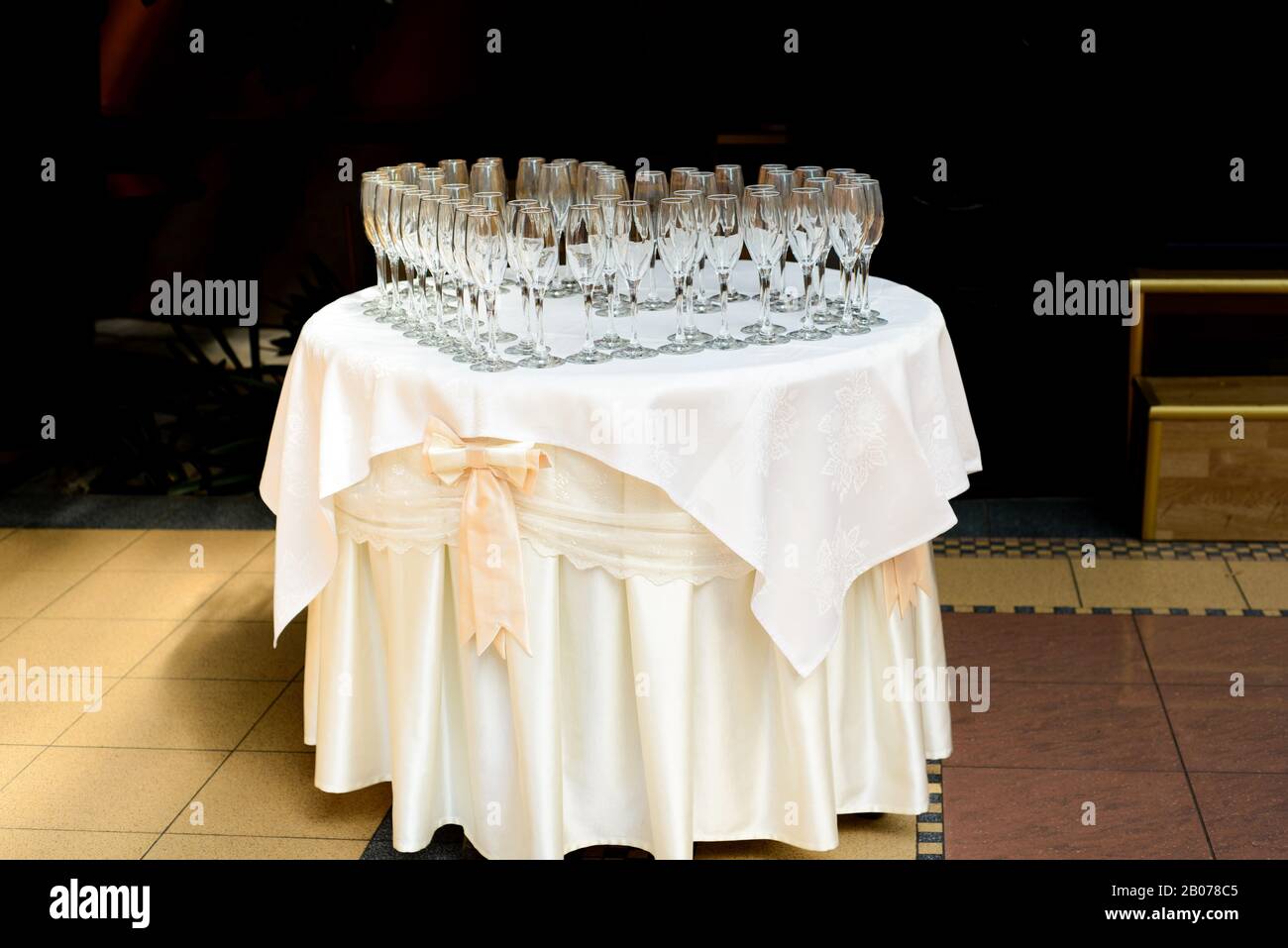 Table with champagne glasses Stock Photo - Alamy