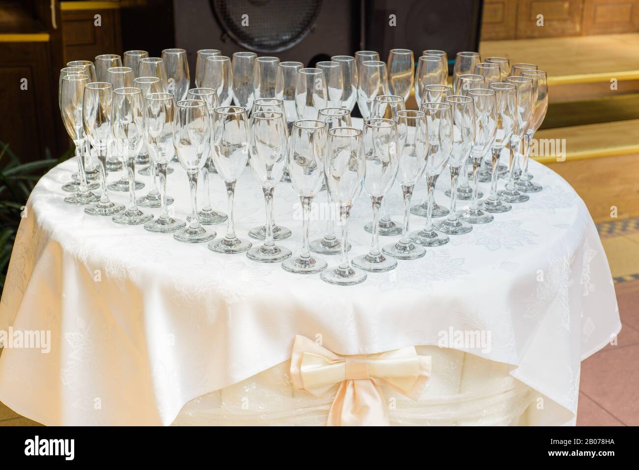 Table with champagne glasses Stock Photo - Alamy