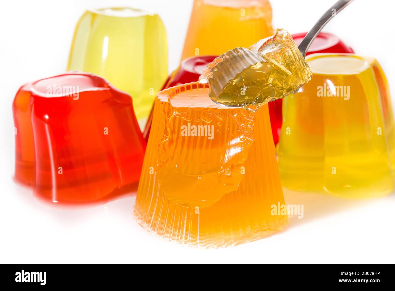 Jellies of different flavors and colorful isolated on white background ...