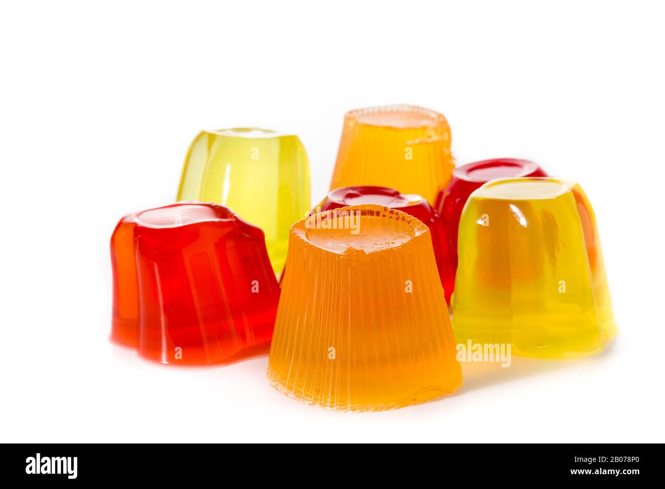 Jellies of different flavors and colorful isolated on white background ...