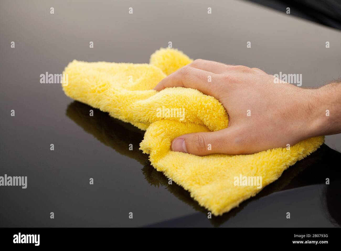 Cleaning car. Microfiber for cleaning and polishing the car Stock Photo ...
