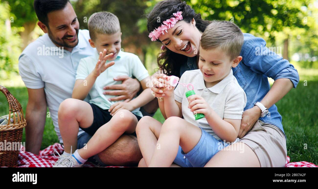 Family with children enjoying a summer day together outdoor Stock Photo ...