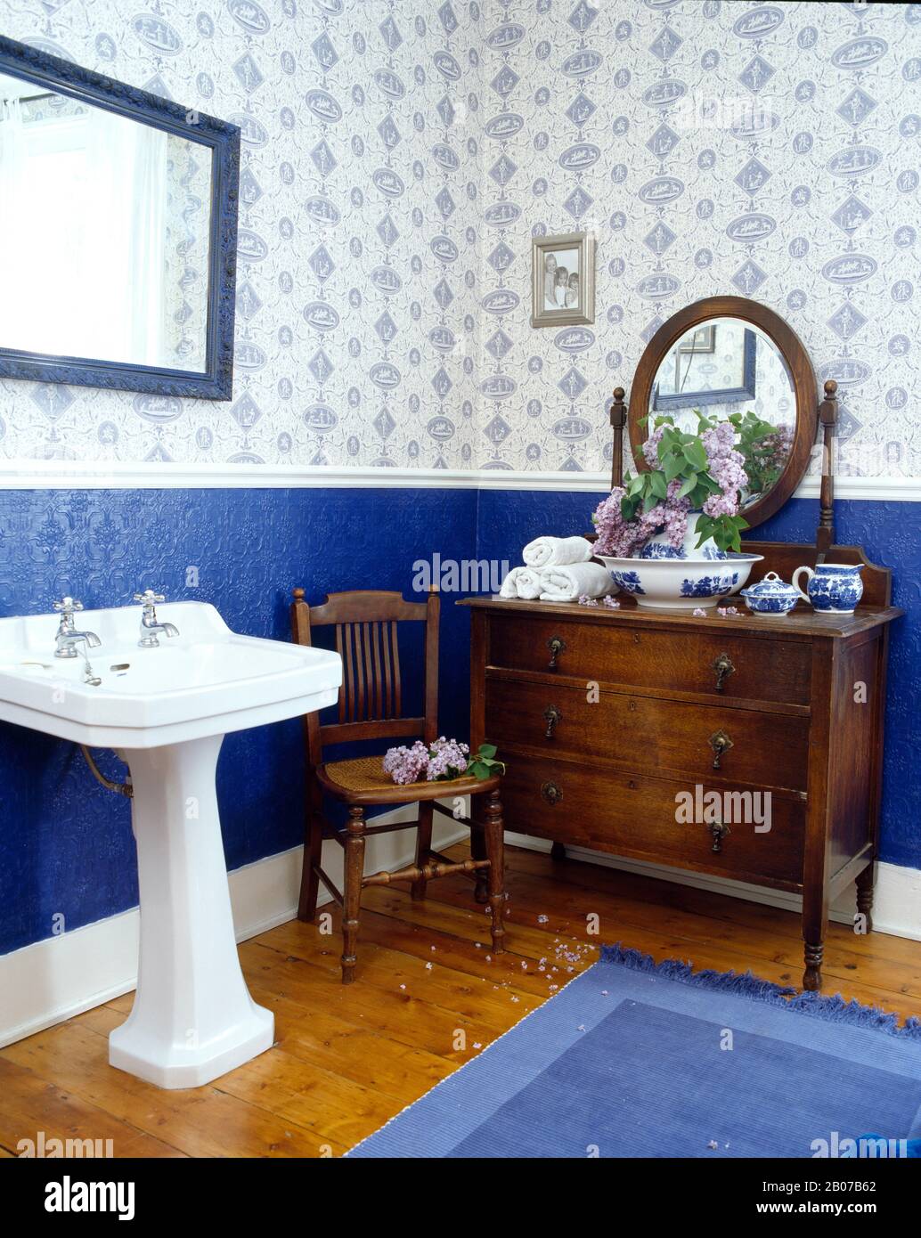 Bathroom with dressing table and washbasin Stock Photo - Alamy