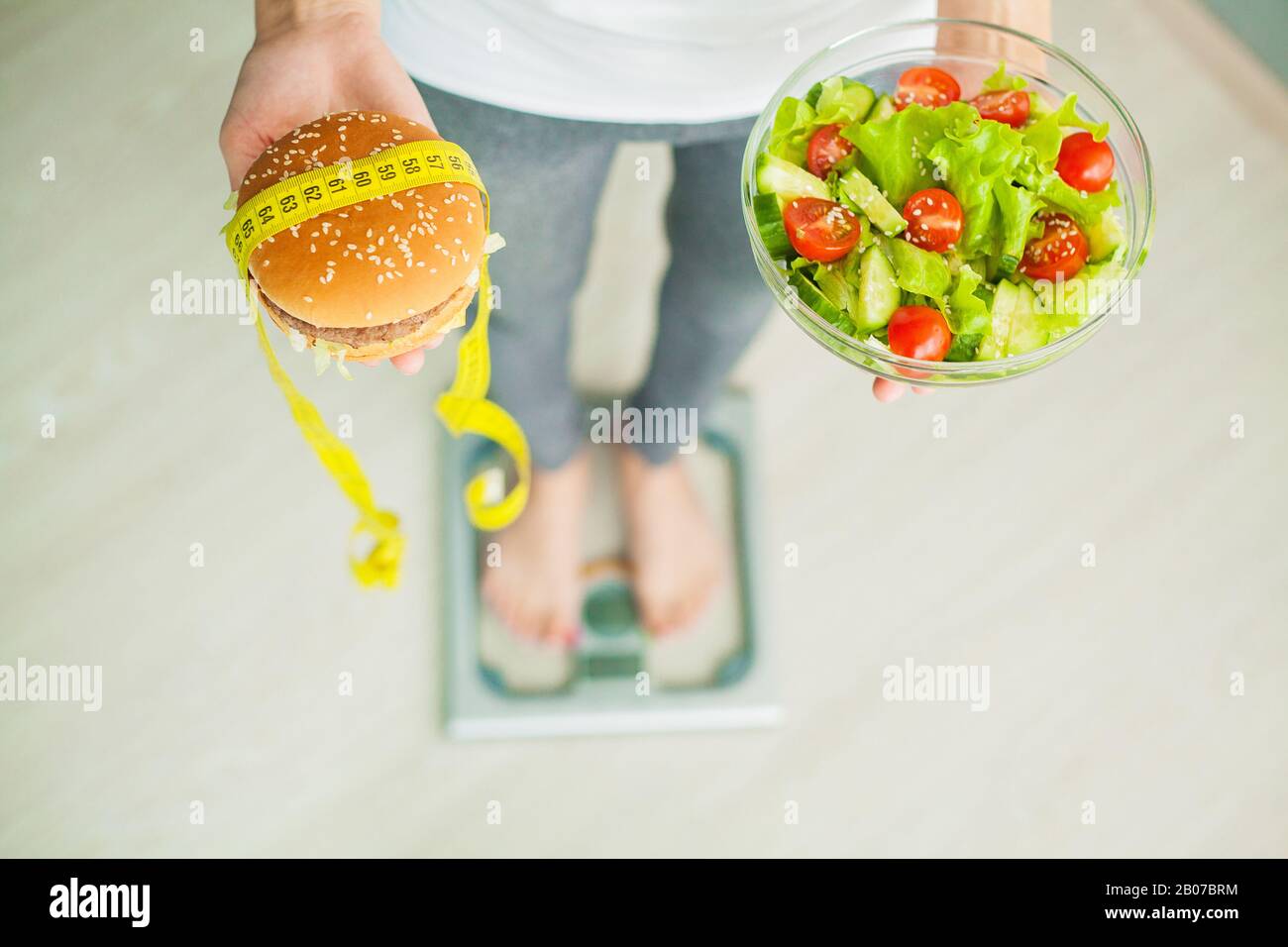 Health. Slim Girl Holding In Hands Fresh Salad. Healthy Eating. Diet ...