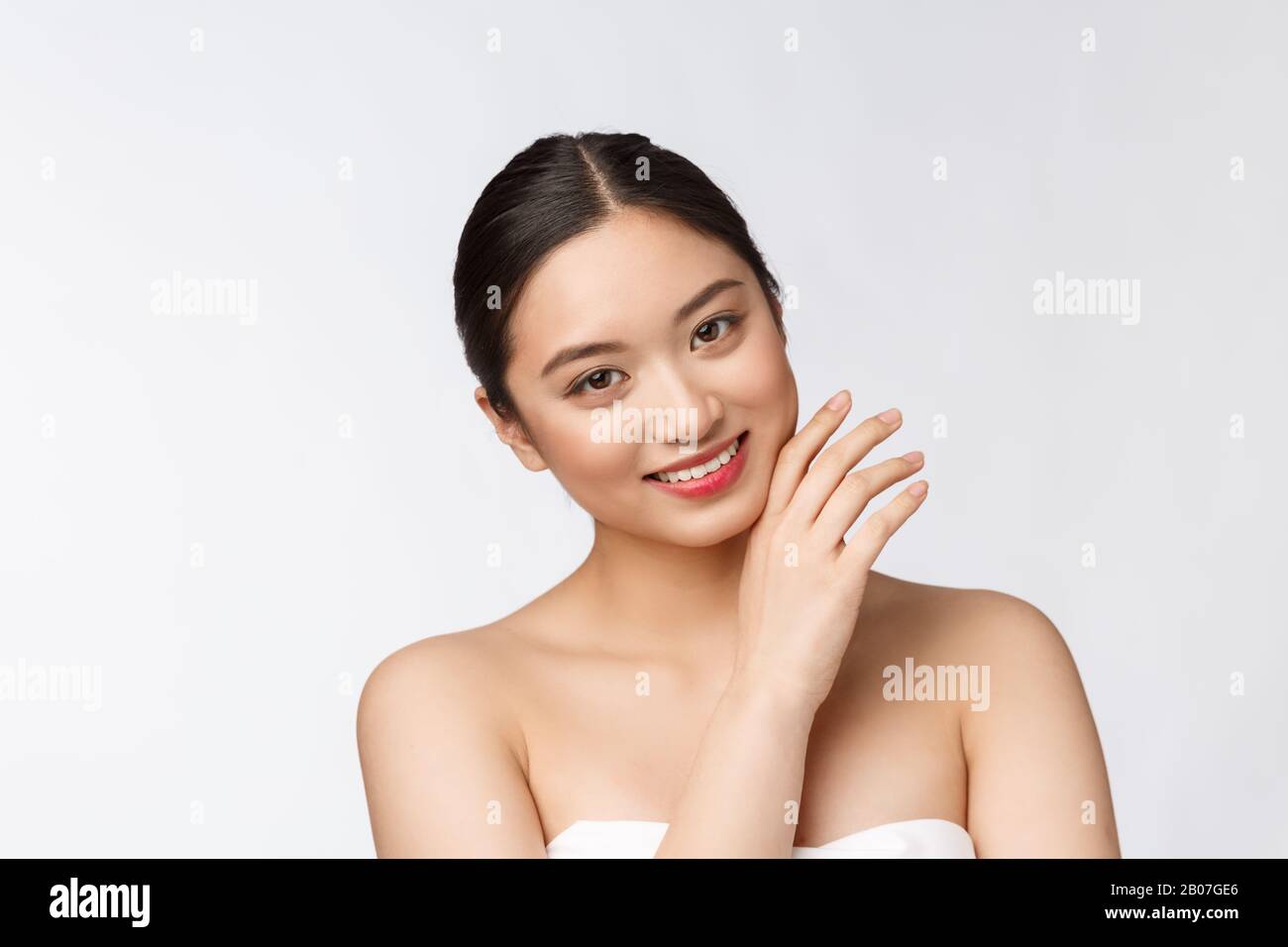 Beautiful asian woman makeup of cosmetic, girl hand touch cheek and ...