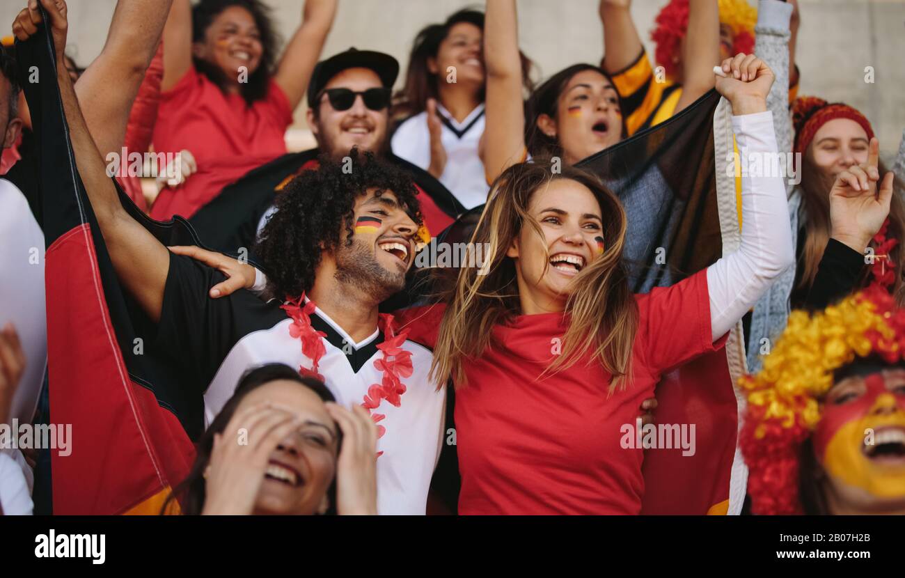Young Germany supporters at stadium. German fans at the stadium ...