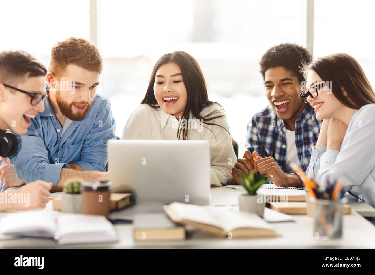 Online education. Group of students studying on computer Stock Photo ...