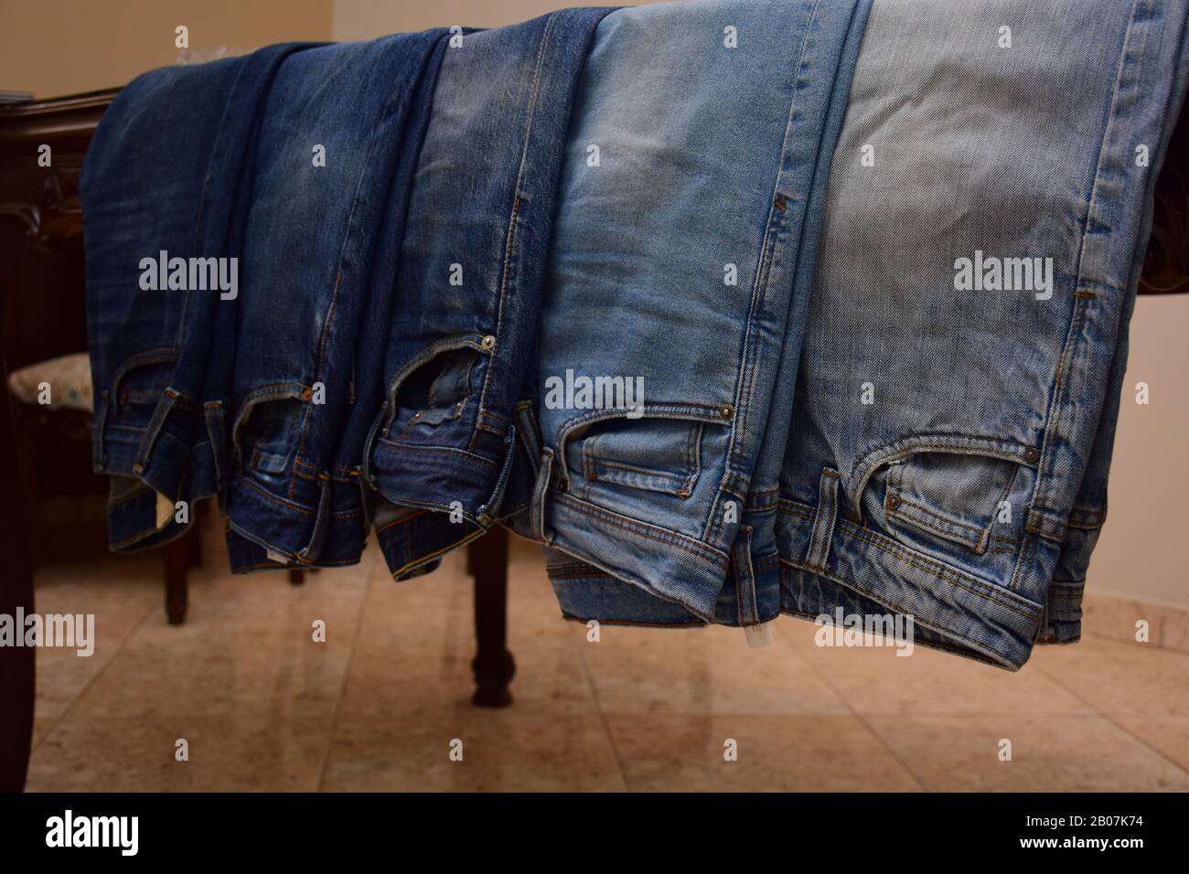 Set of Colorful shades of blue jeans trousers isolated in style light ...