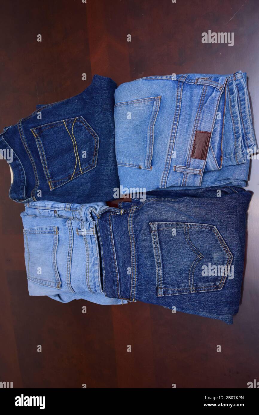 Set of Colorful shades of blue jeans trousers isolated in style light ...
