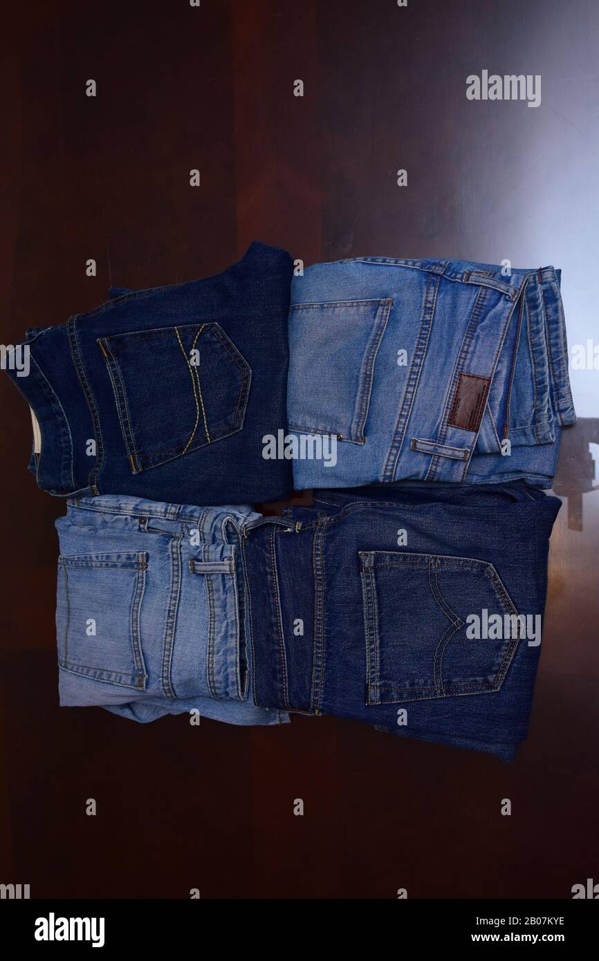 Set of Colorful shades of blue jeans trousers isolated in style light ...