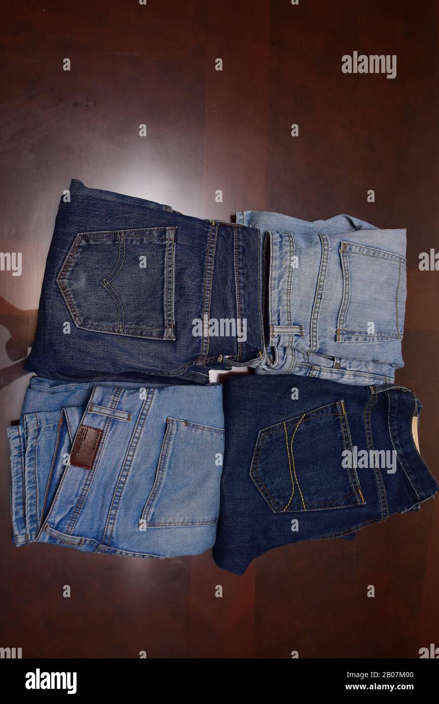 Set of Colorful shades of blue jeans trousers isolated in style light ...