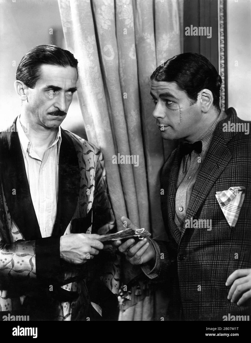 OSGOOD PERKINS and PAUL MUNI as Tony Camonte in SCARFACE 1932 directors ...