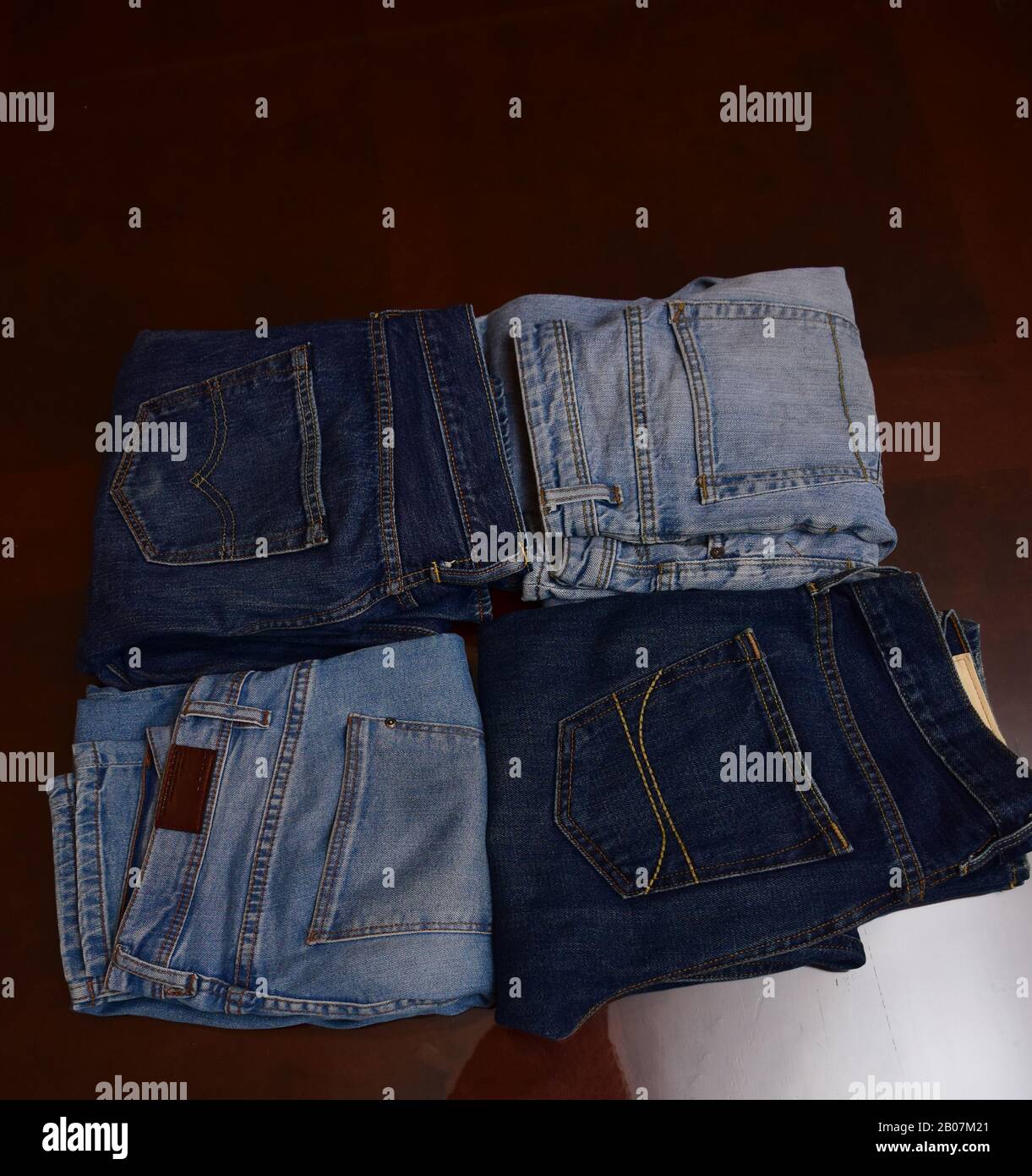 Set of Colorful shades of blue jeans trousers isolated in style light ...