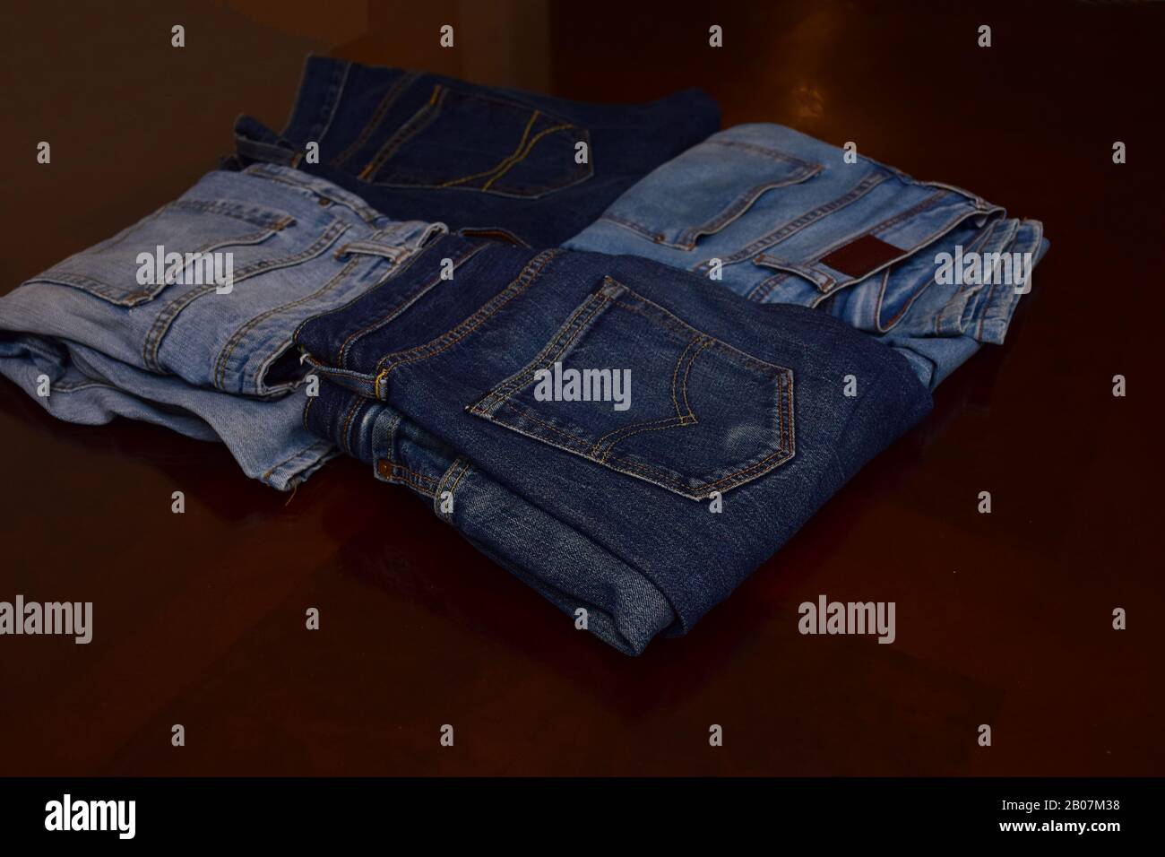 Set of Colorful shades of blue jeans trousers isolated in style light ...
