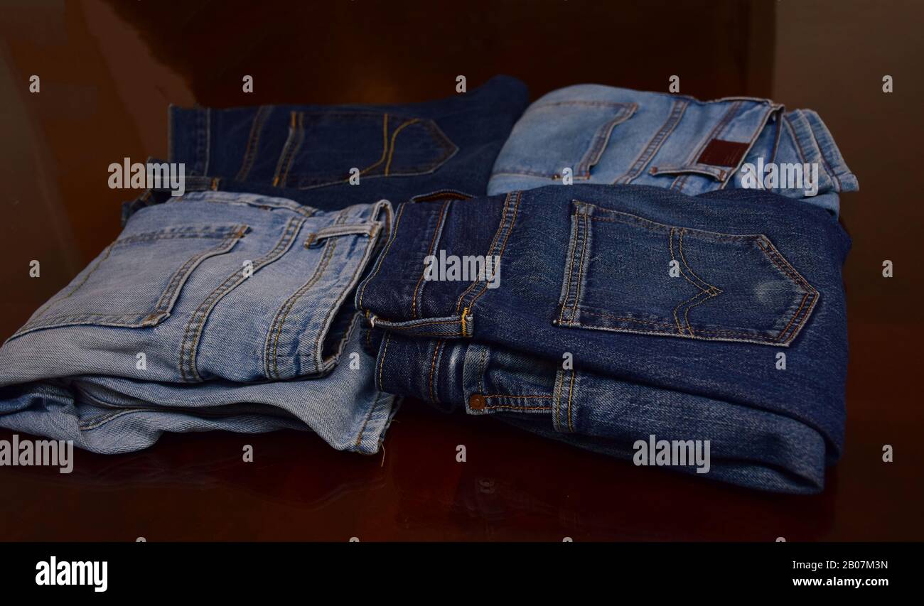 Set of Colorful shades of blue jeans trousers isolated in style light ...