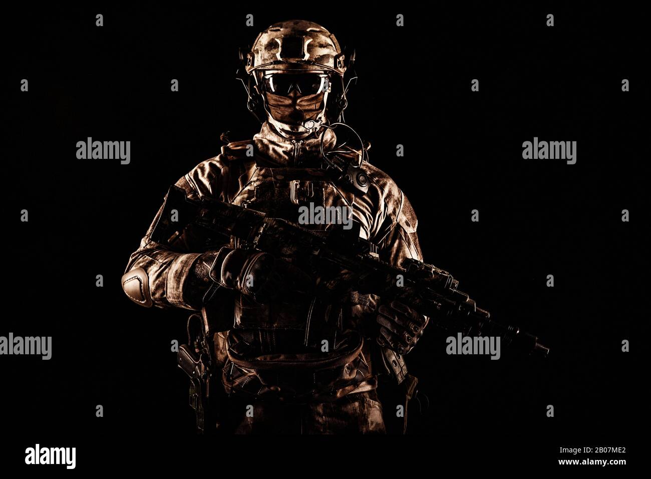 Army special operations forces soldier in mask and combat uniform ...
