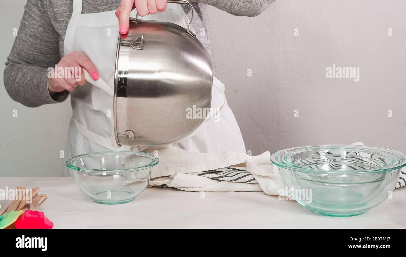 Step by step. Flat lay. Mixing royal icing in electric kitchen mixer ...