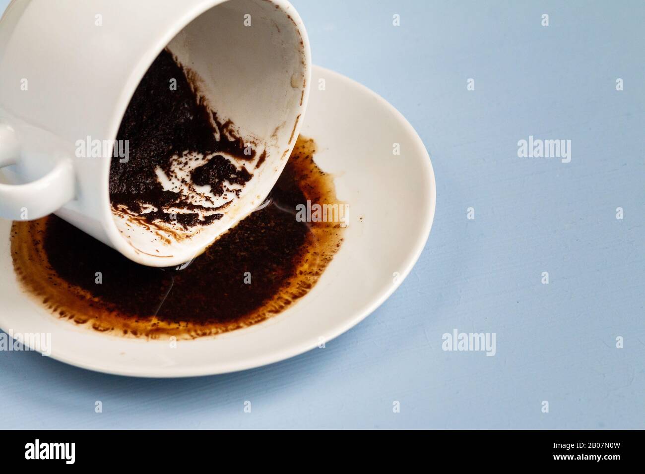 coffee grounds in a white cup ready for fortune telling, destiny ...