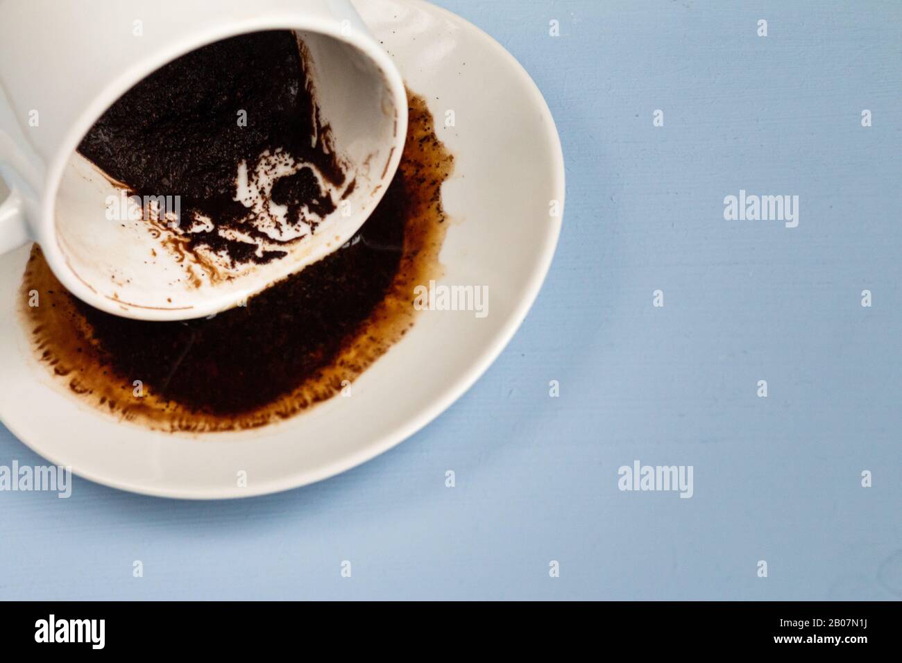 coffee grounds in a white cup ready for fortune telling, destiny ...