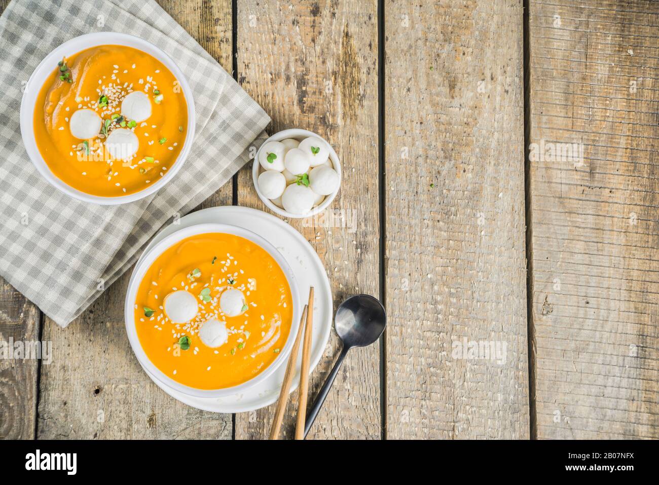 Hobak juk, korean traditional pumpkin porridge soup, with rice balls ...
