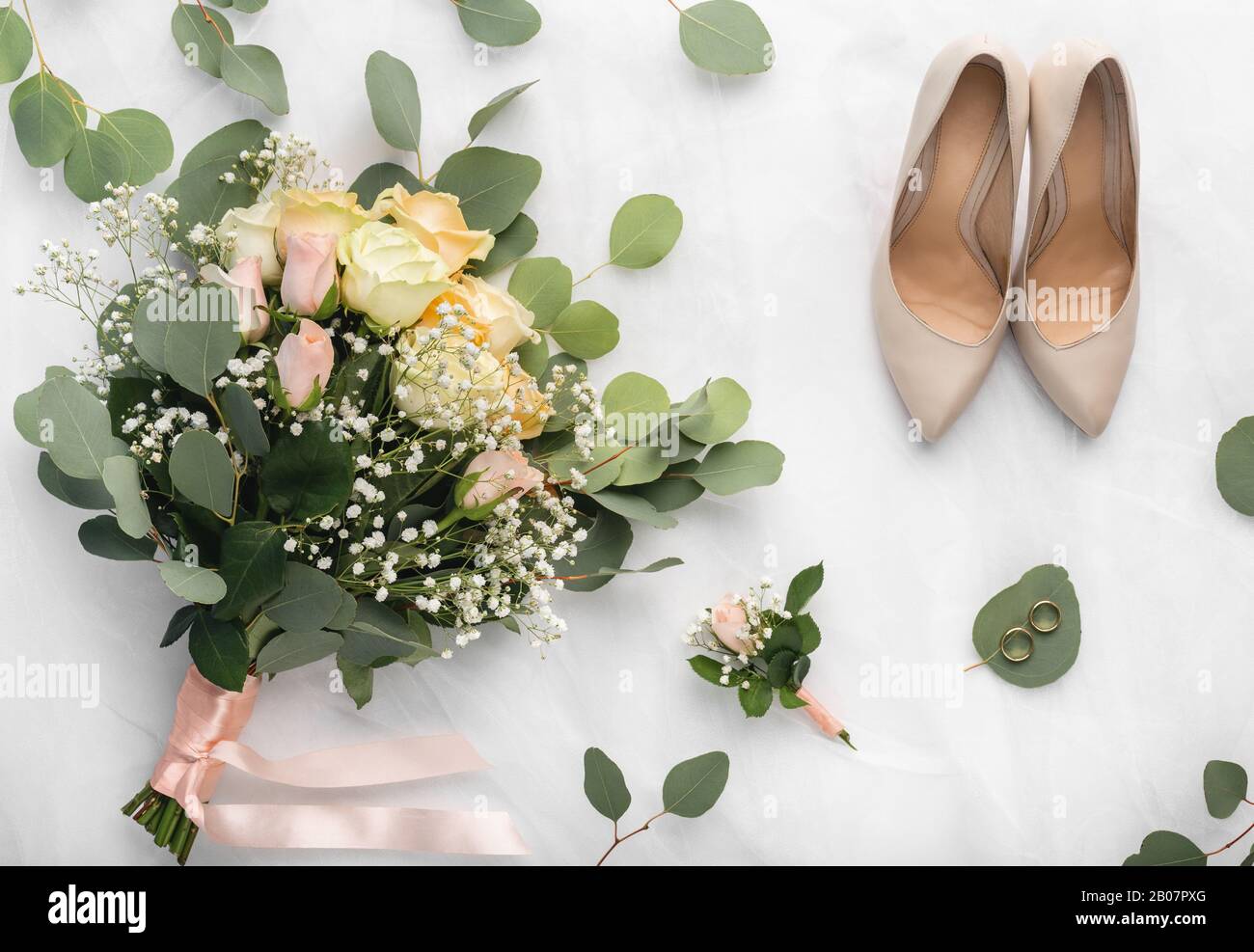 Wedding accessories in bride and groom room on white Stock Photo - Alamy