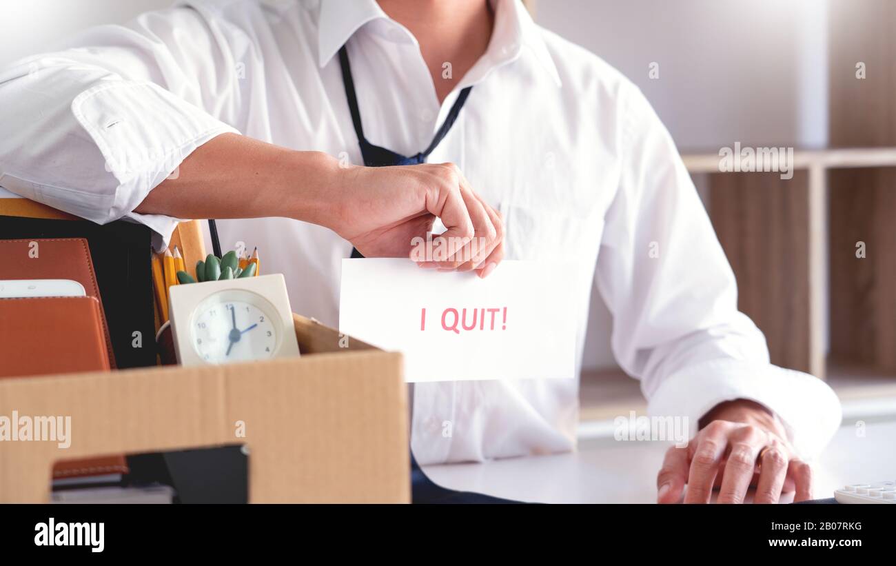 Businessman holding with I quit words card letter, resign employee ...