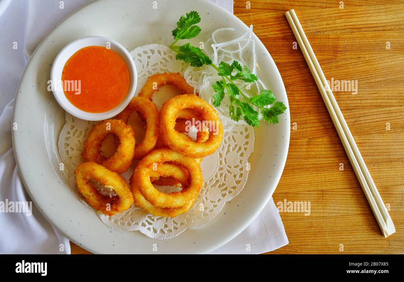 Fried calamari rings with a sweet and sour sauce at a Japanese sushi ...