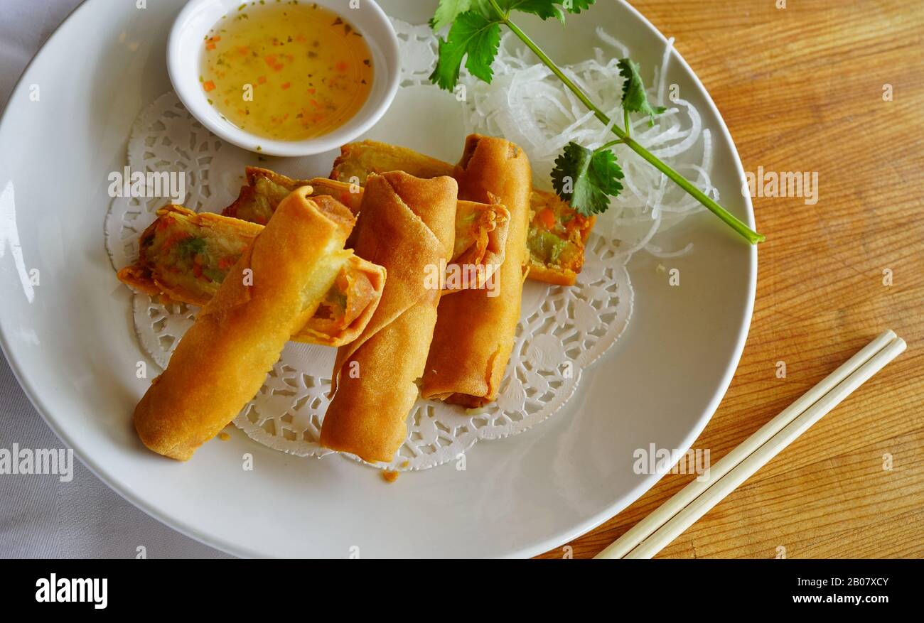 Fried Filipino vegetable spring rolls at an Asian restaurant Stock ...