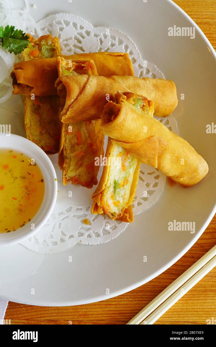 Fried Filipino vegetable spring rolls at an Asian restaurant Stock ...