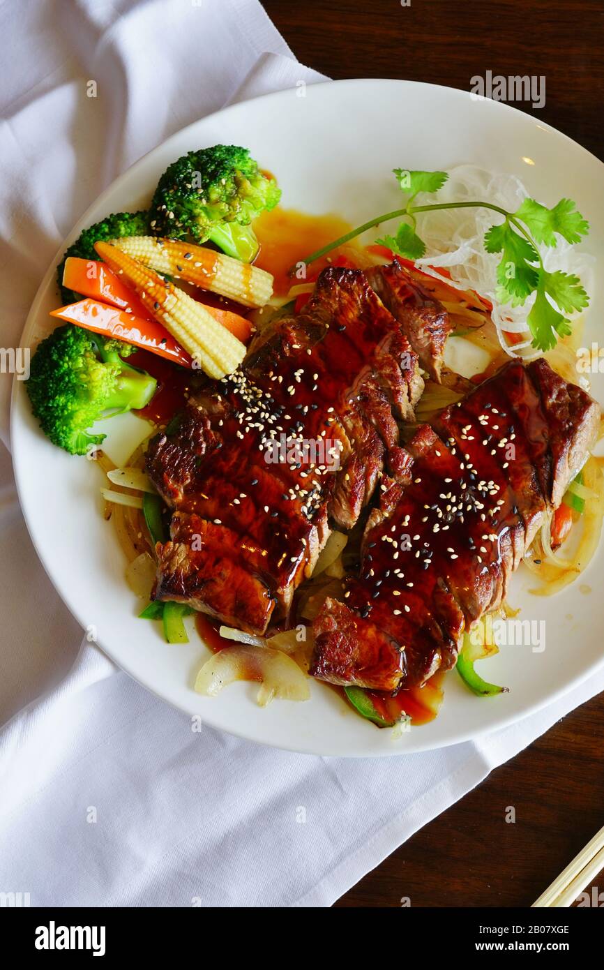 A plate with beef teriyaki at a Japanese restaurant Stock Photo - Alamy