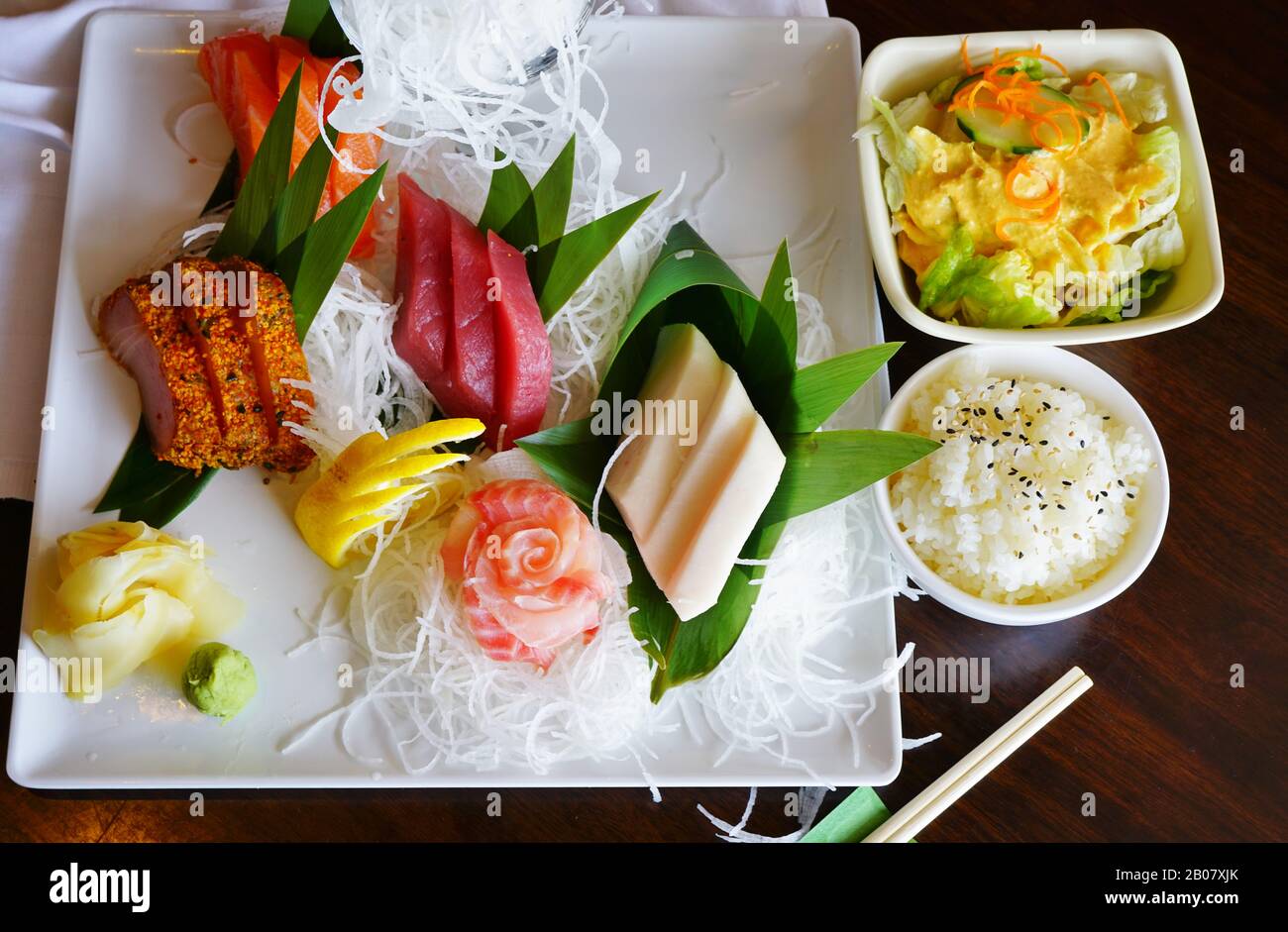 A plate of raw fish sashimi at a Japanese restaurant Stock Photo - Alamy