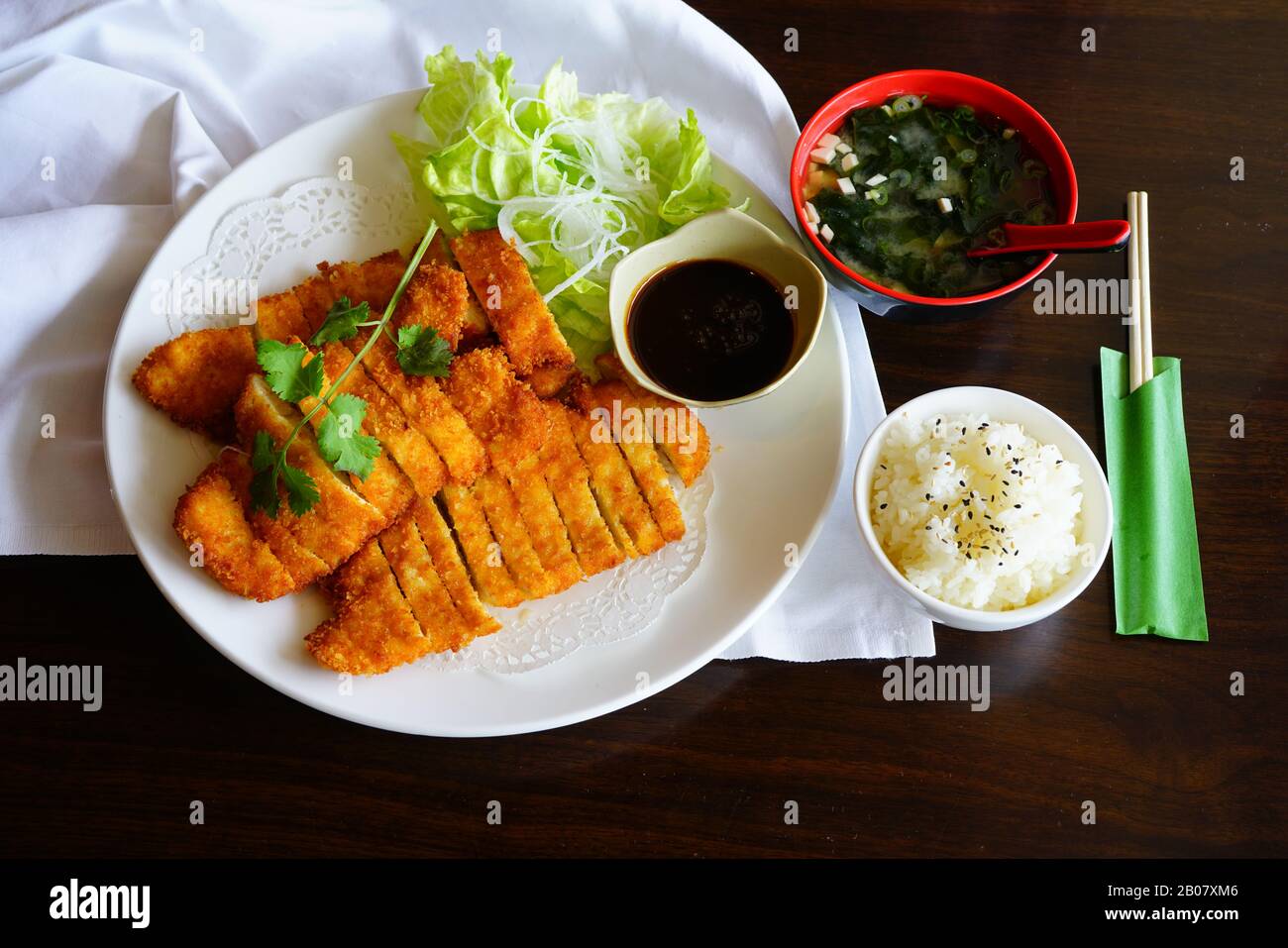 A plate of sliced fried chicken katsu at a Japanese restaurant Stock ...