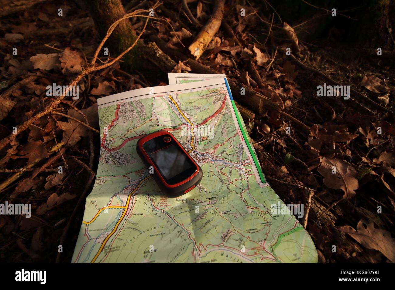 Forest with a map and gps hi-res stock photography and images - Alamy