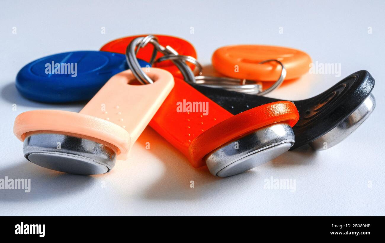 Magnetic keys on a white background. White background Stock Photo - Alamy