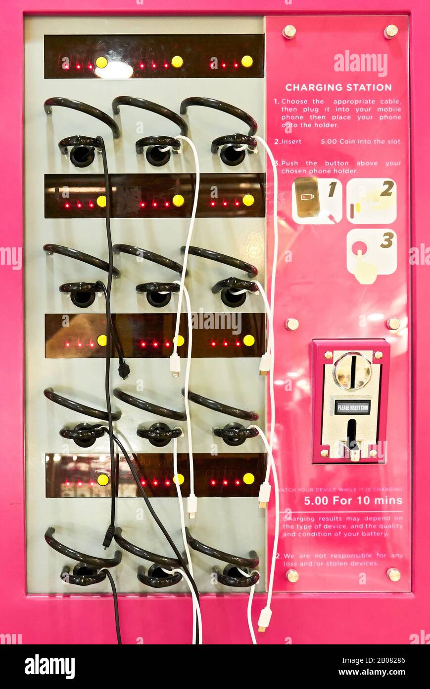 Simple colorful pay cellphone charging station inside a tourist travel ...