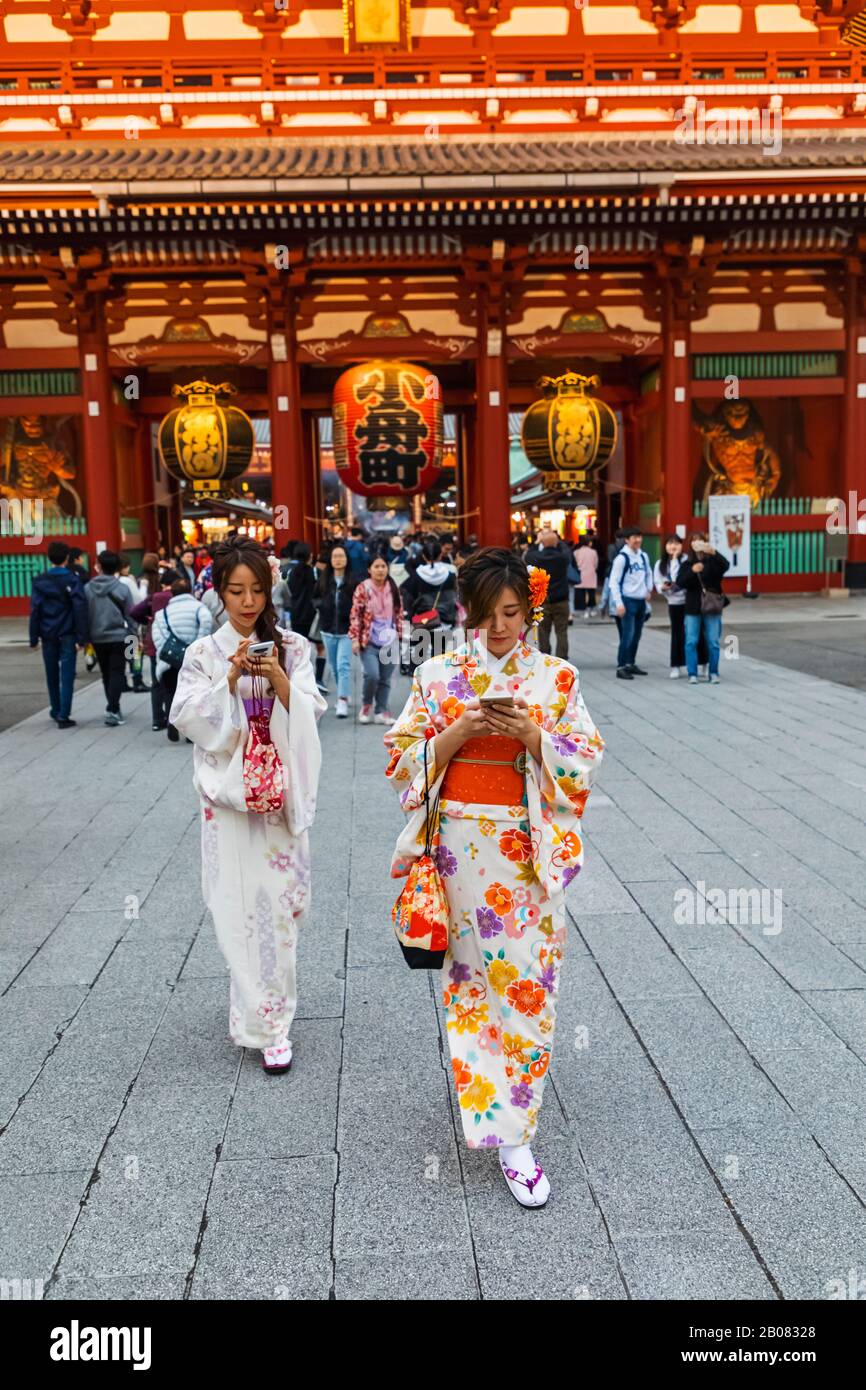 Japan Honshu Tokyo Asakusa Sensoji Temple Women In Kimono Texting