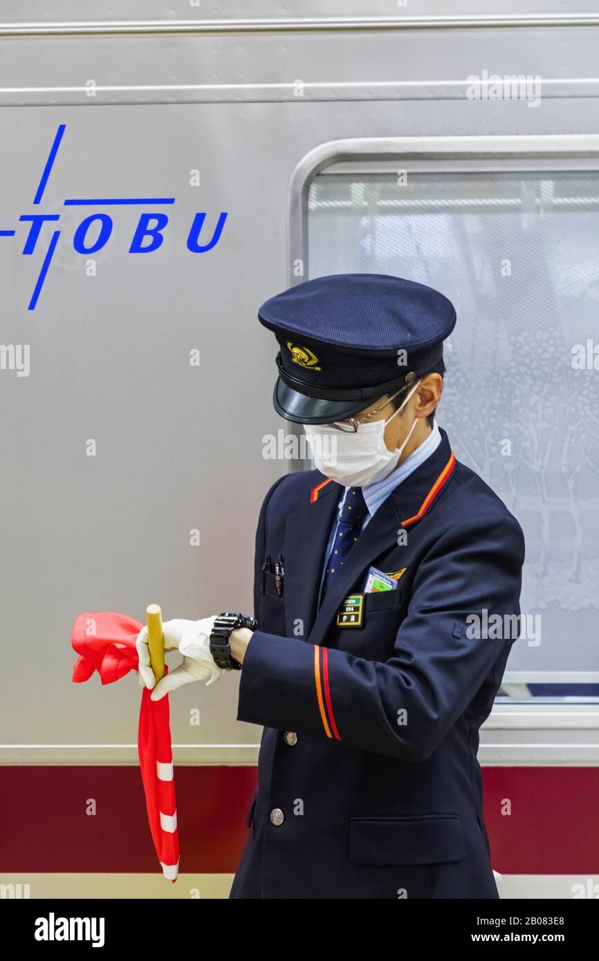 Japan, Honshu, Tokyo, Asakusa Station, Tobu Railways, Platform Guard ...
