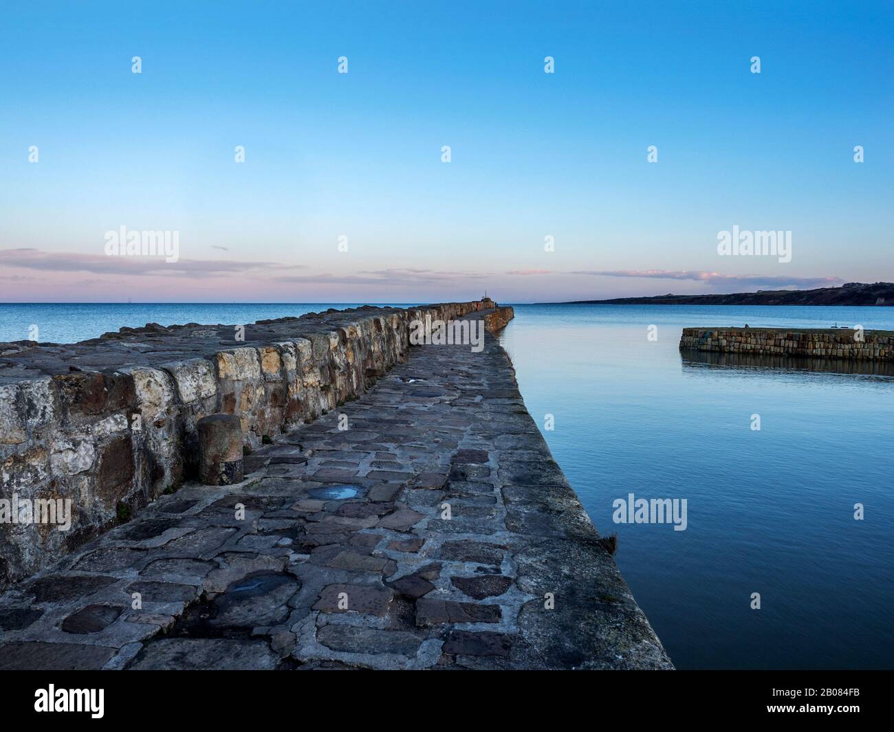 Looking out to sea from St Andrews Harbour at dusk St Andrews Fife ...