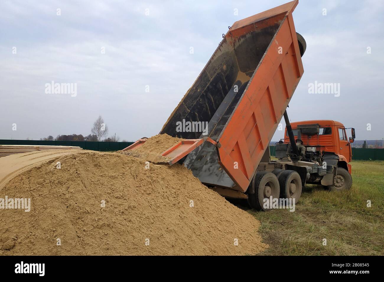 Dump Truck Unloading Sand High Resolution Stock Photography and Images ...