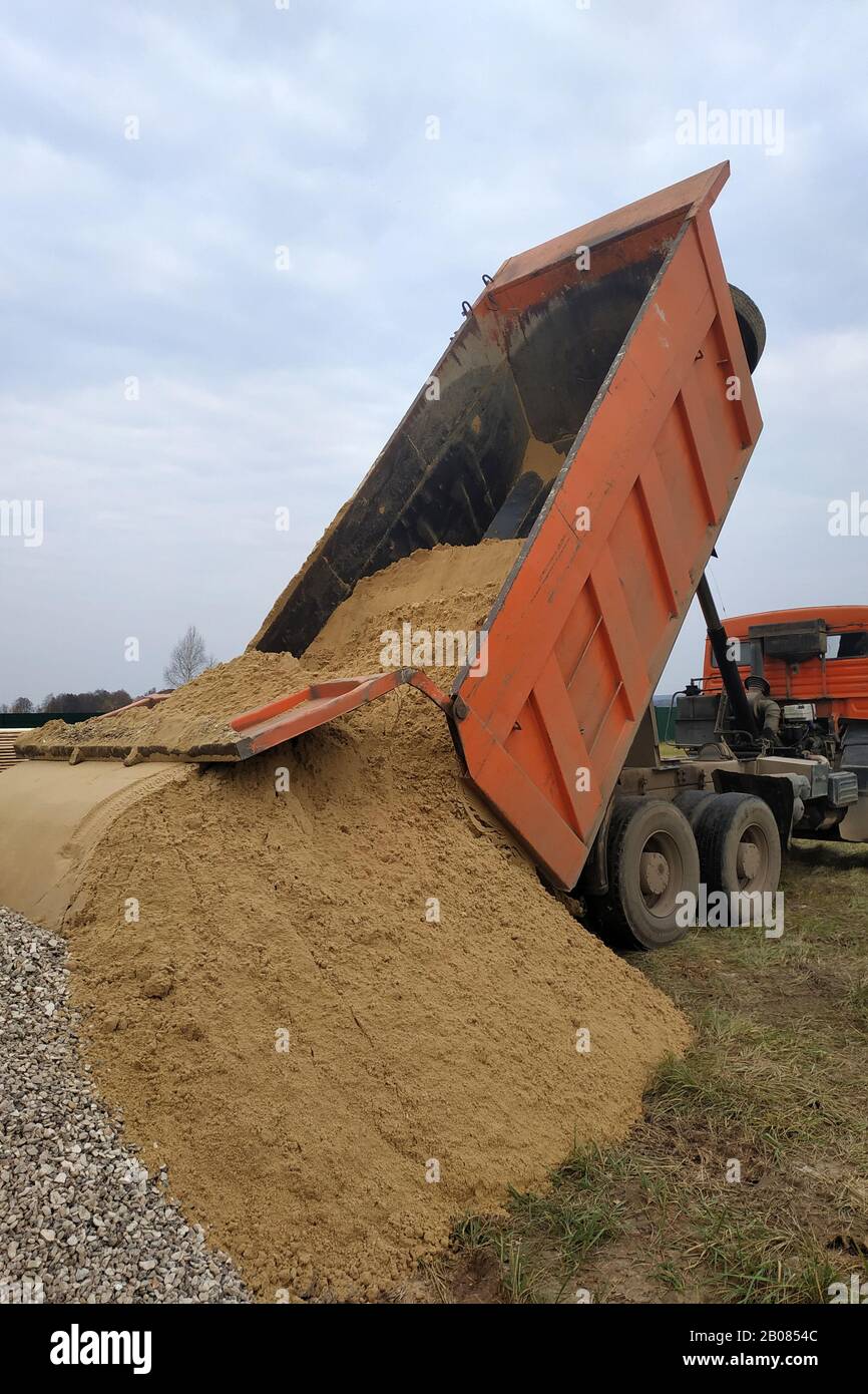 Dump Truck Unloading Sand High Resolution Stock Photography and Images ...