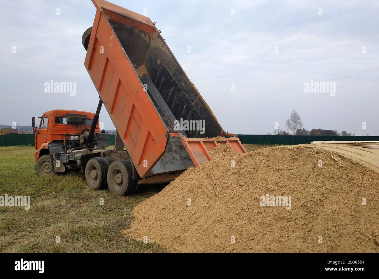Dump Truck Unloading Sand High Resolution Stock Photography and Images ...