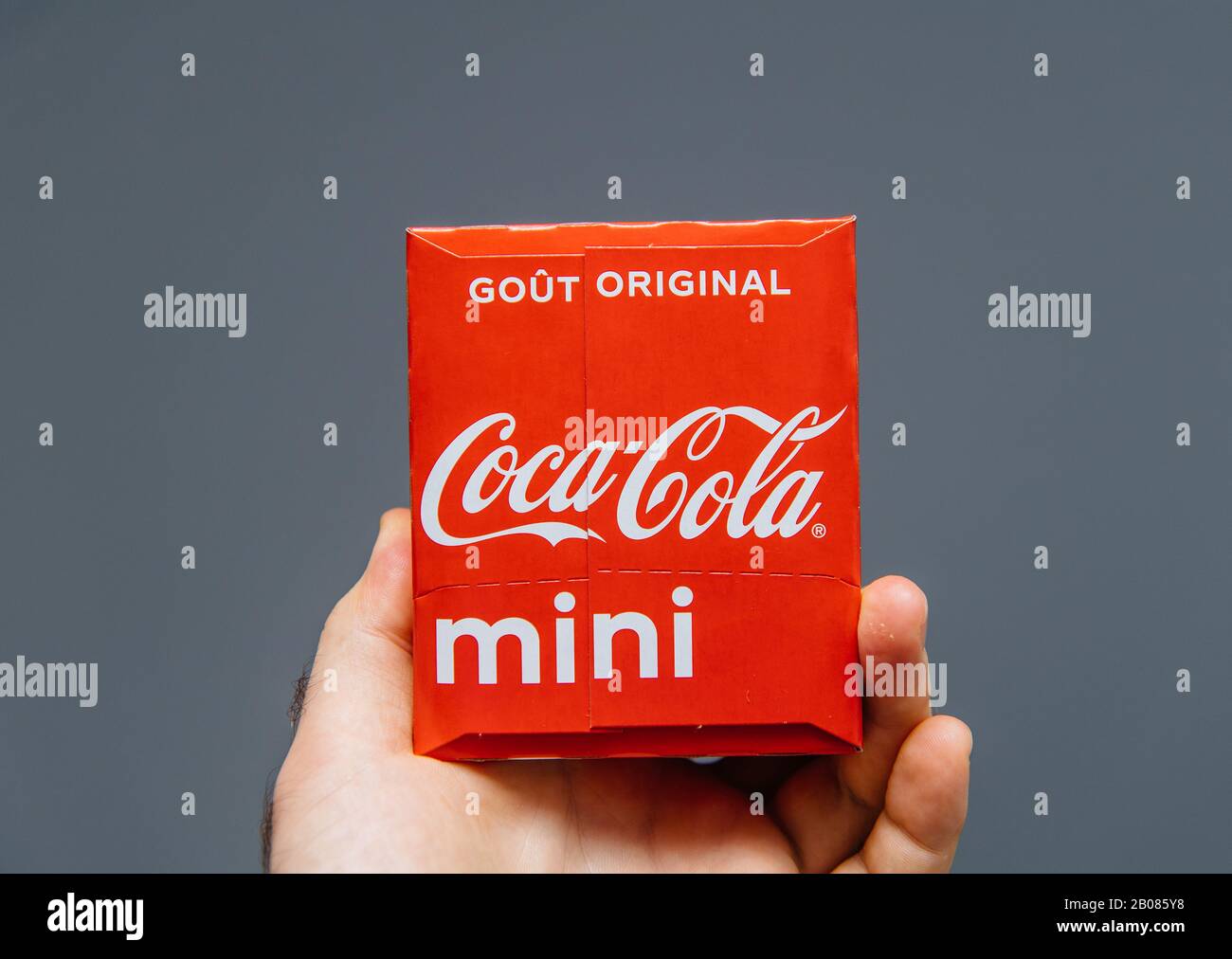 Hand holding coca cola bottle hi-res stock photography and images - Alamy