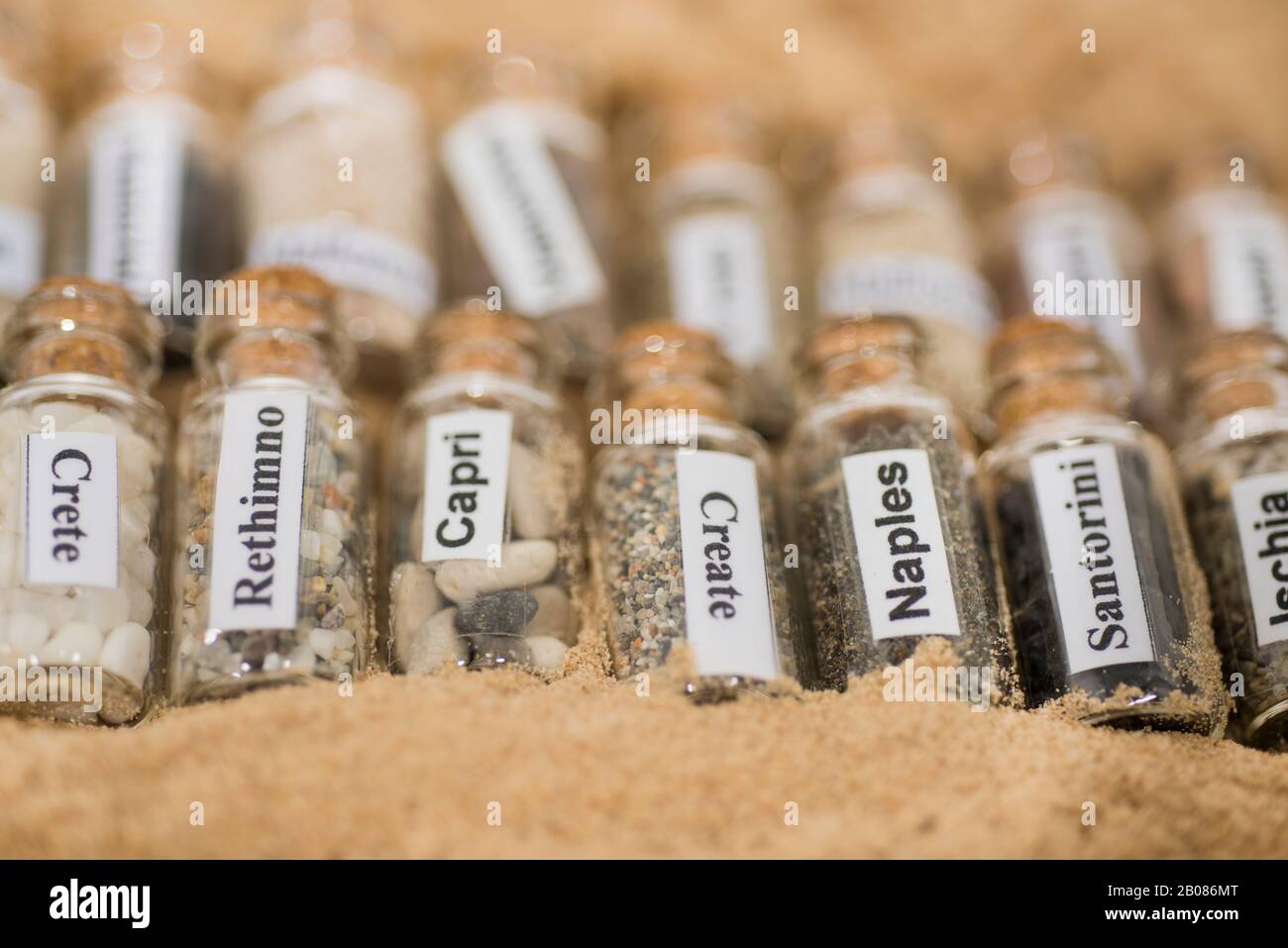 Glass test-tube with sand of different summer vacation countries Stock ...
