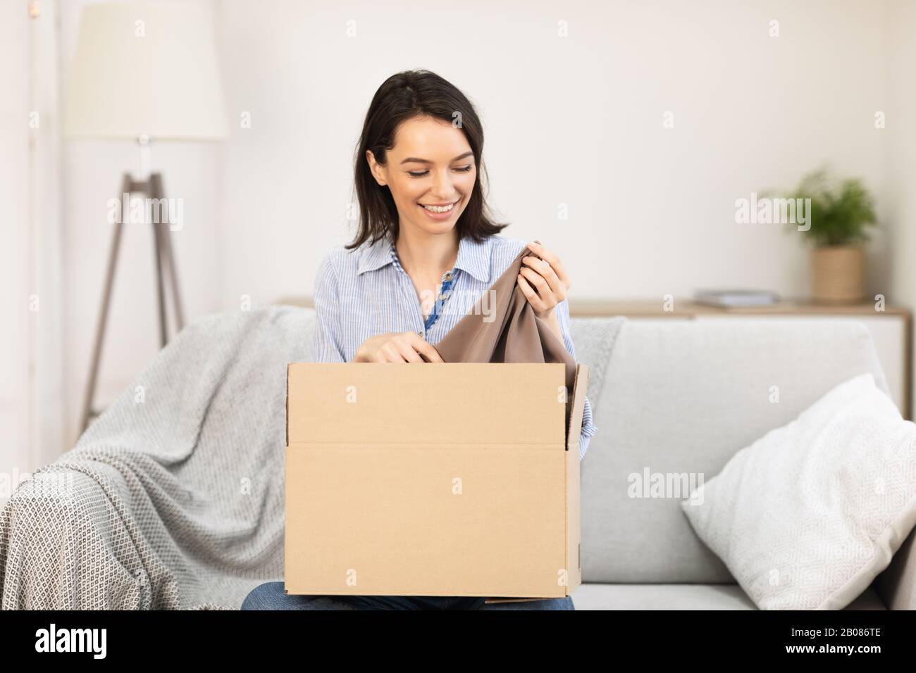New clothes unboxing hi-res stock photography and images - Alamy