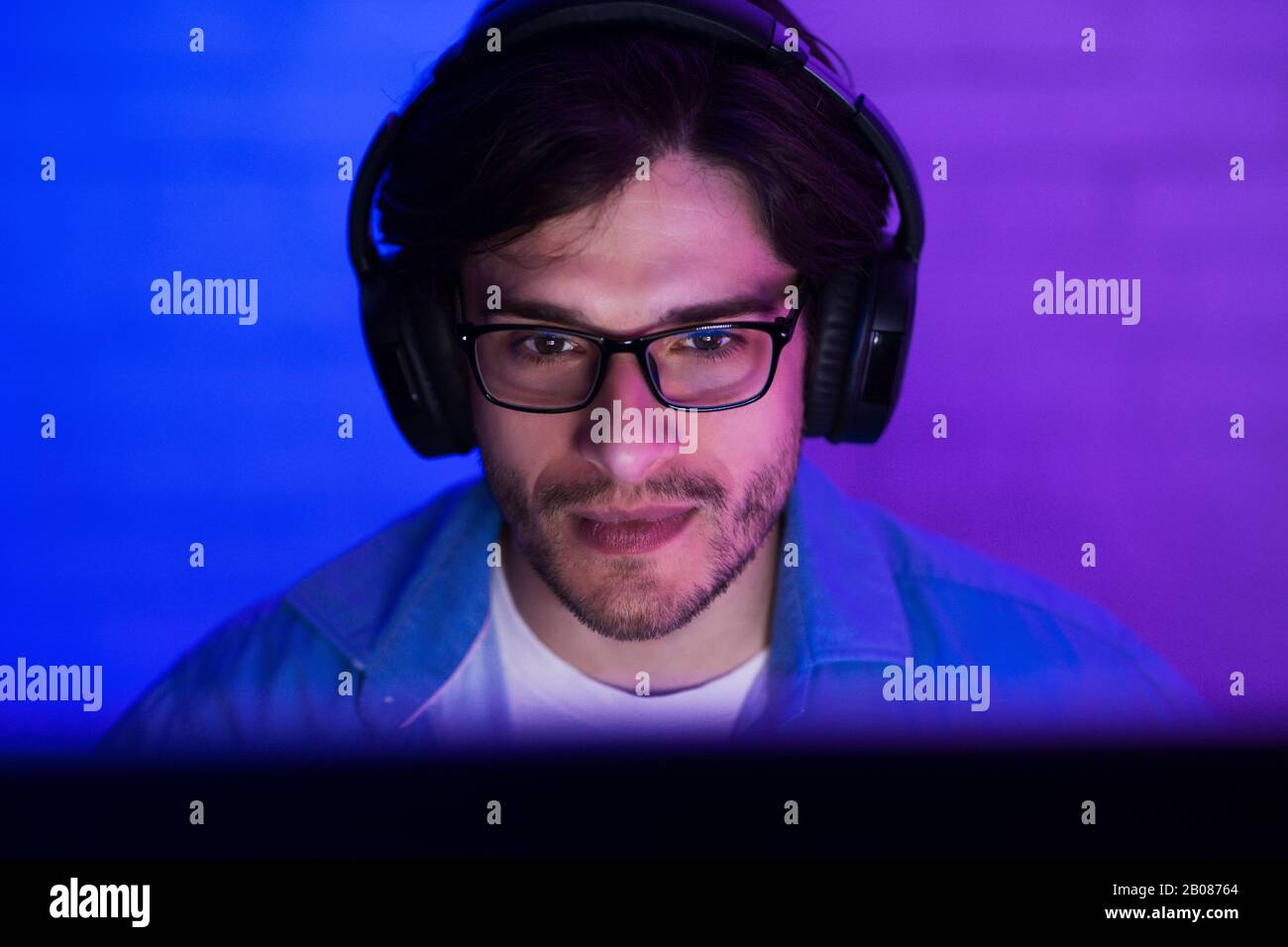 Guy At Desktop PC Playing Computer Game Indoor At Night Stock Photo - Alamy