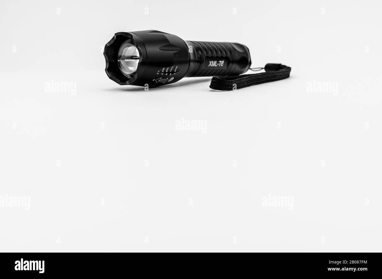 mini LED flashlight with black metallic body Stock Photo - Alamy