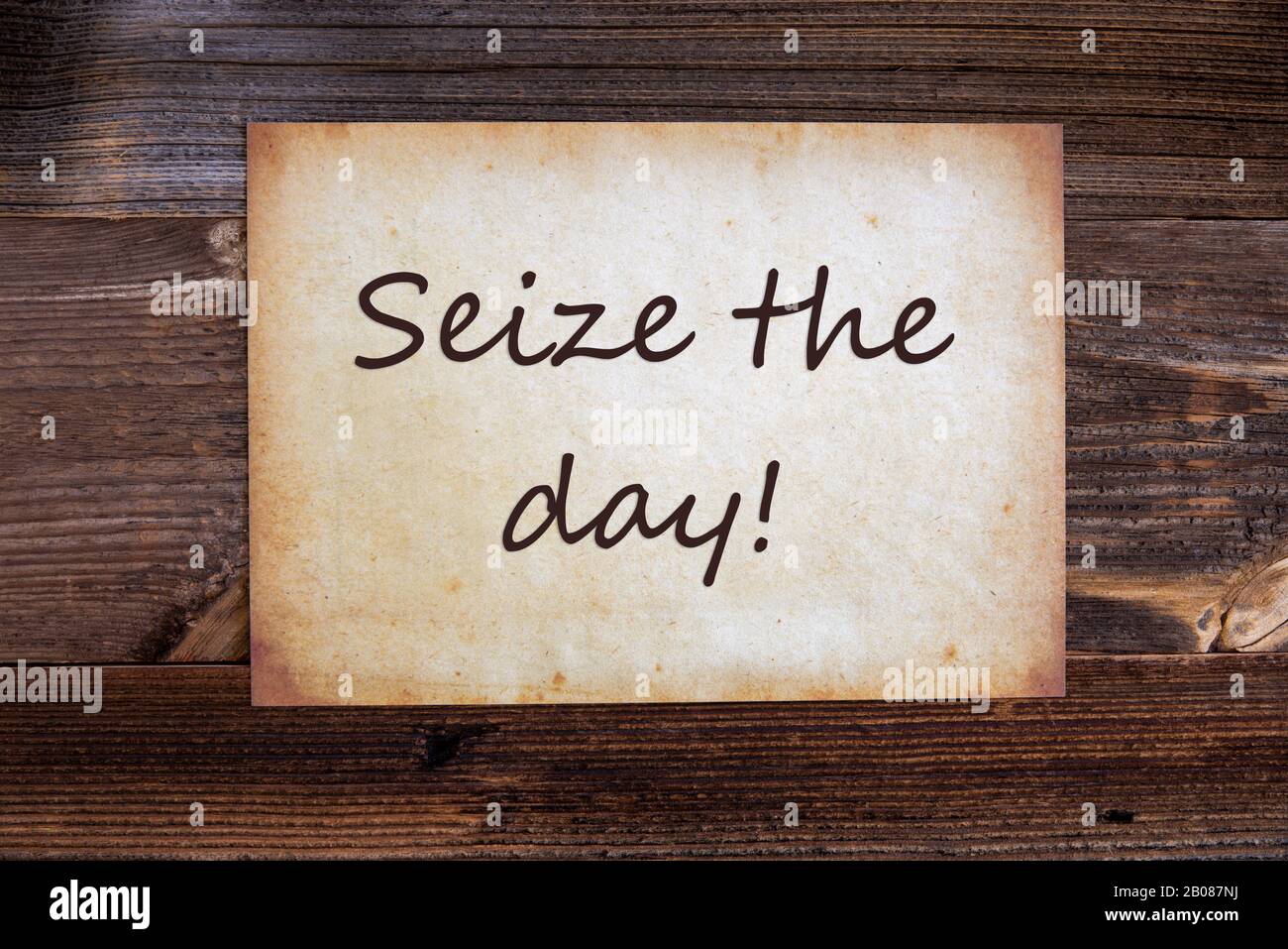 Old Paper, English Text Seize The Day, Wooden Background Stock Photo ...