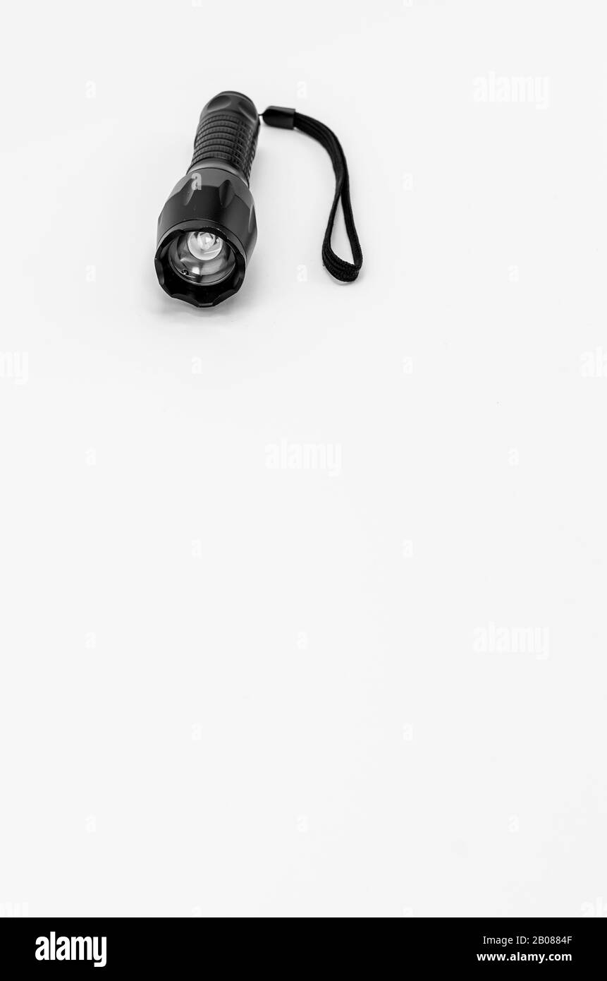 mini LED flashlight with black metallic body Stock Photo - Alamy